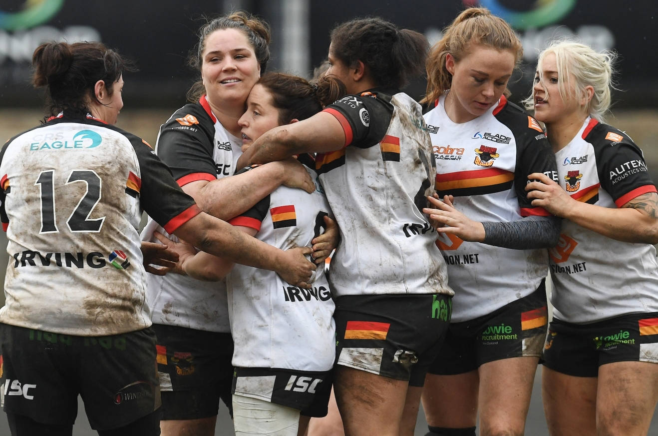 Champions off the mark, as Wigan make history